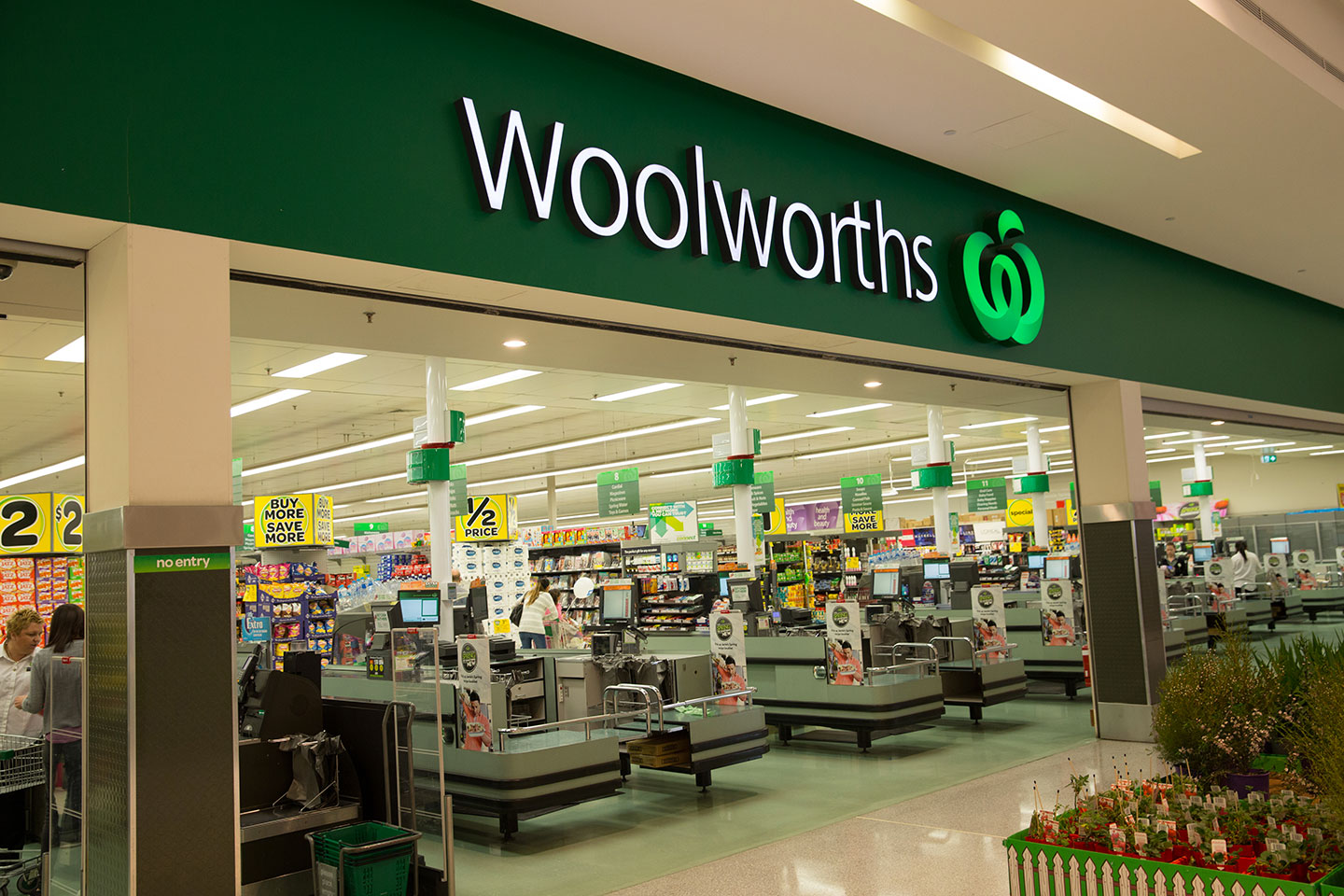 Woolworths faces class action on downgrade