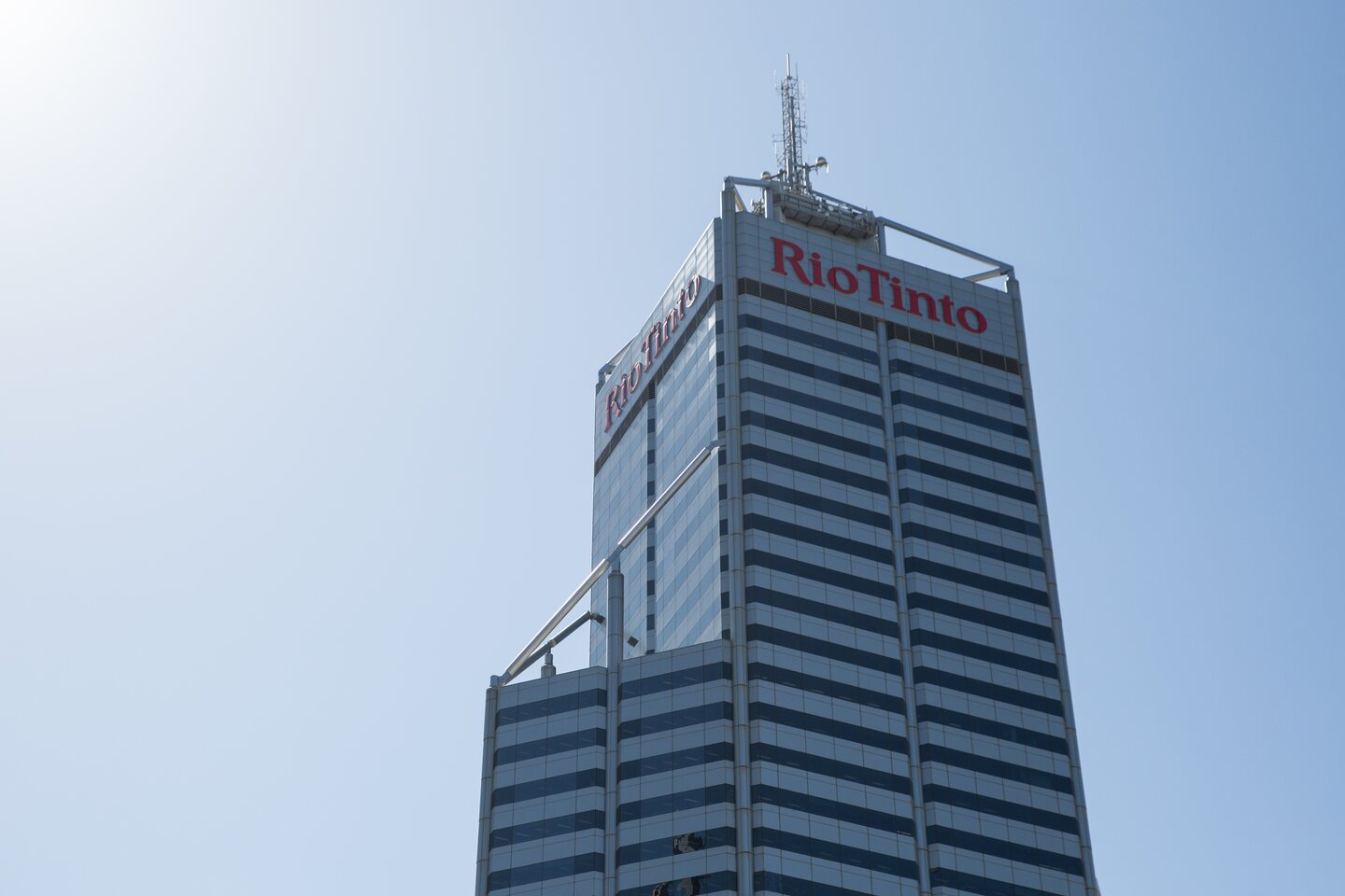 Rio Tinto clips dividend as profit slides