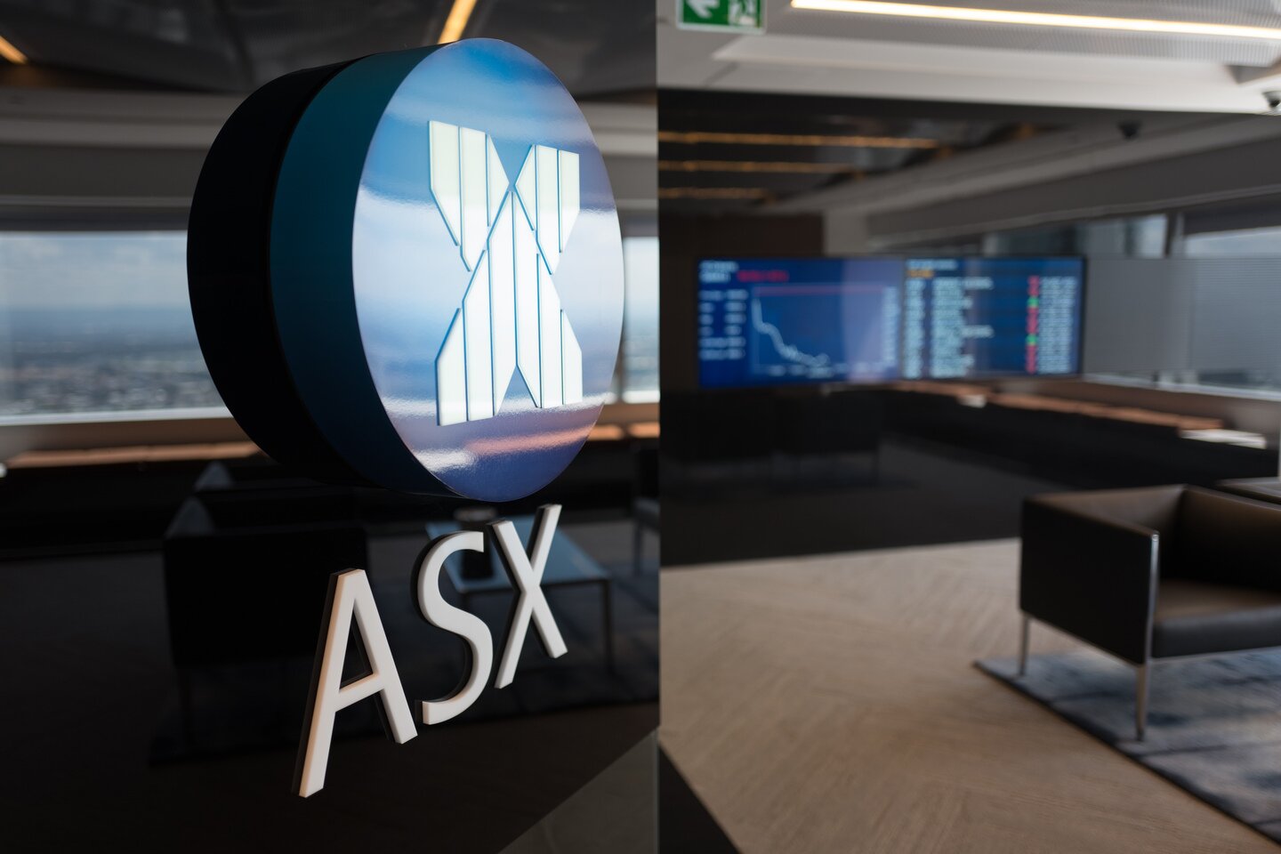 Aussie share market retreats from record high levels